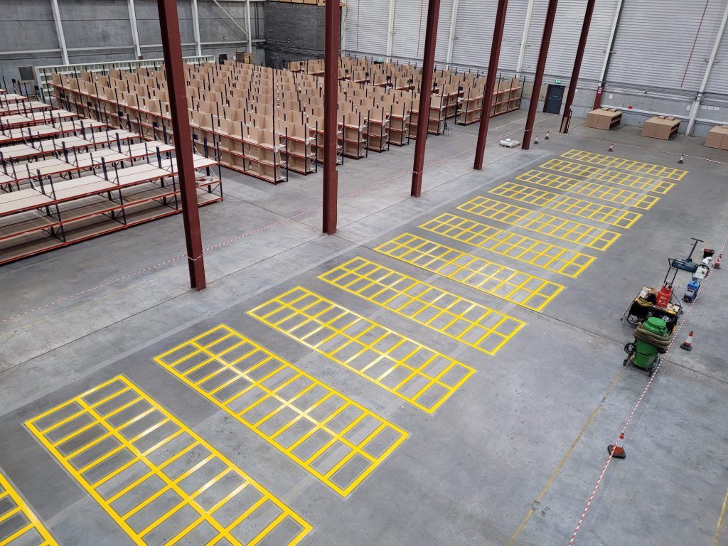 Warehouse block stacking with signs, labels and line marking