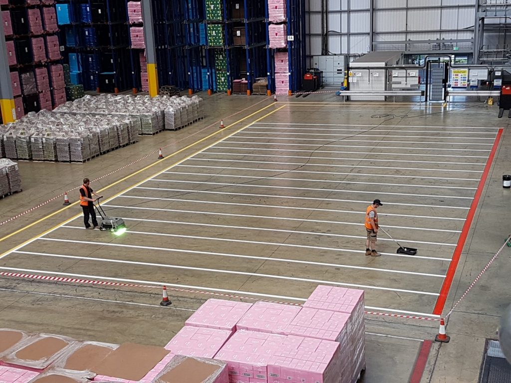 Warehouse block stacking with signs, labels and line marking